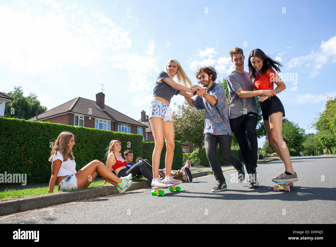 Group of seven people standing hi-res stock photography and images - Alamy