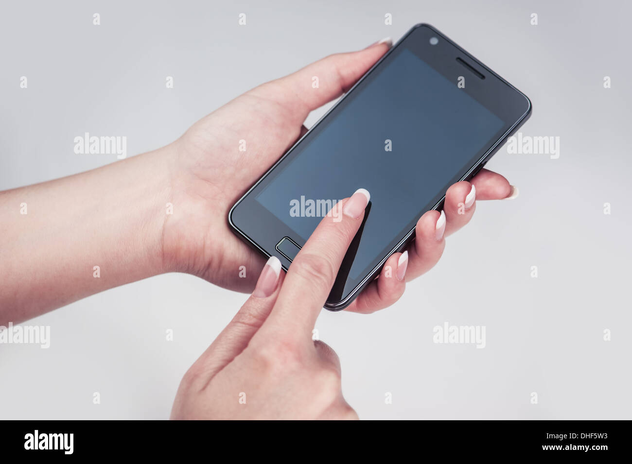 mobile phone in girl hand Stock Photo - Alamy