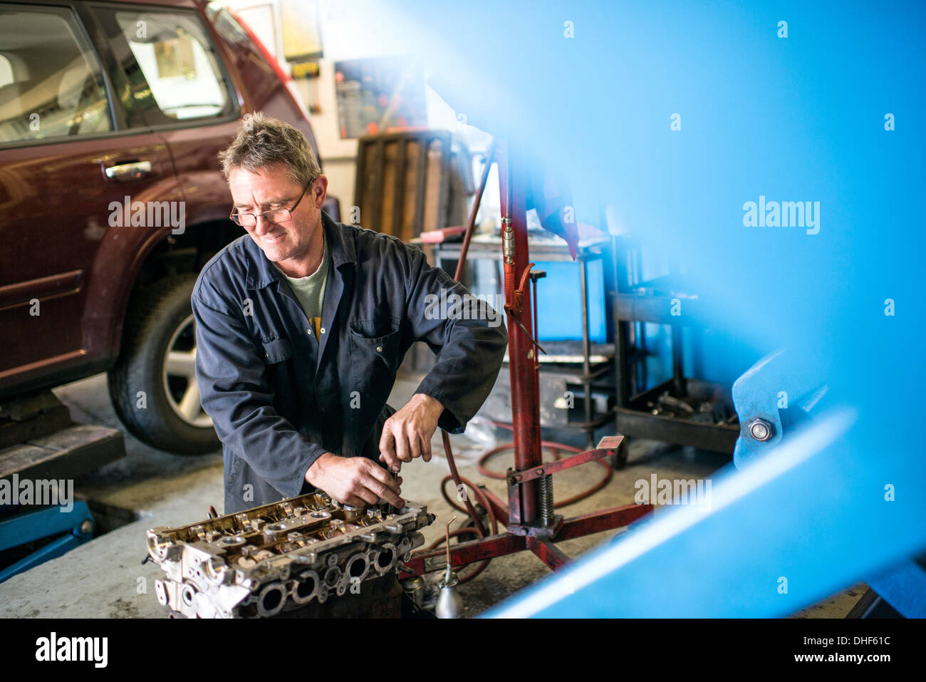 Mechanic working on car hi-res stock photography and images - Alamy