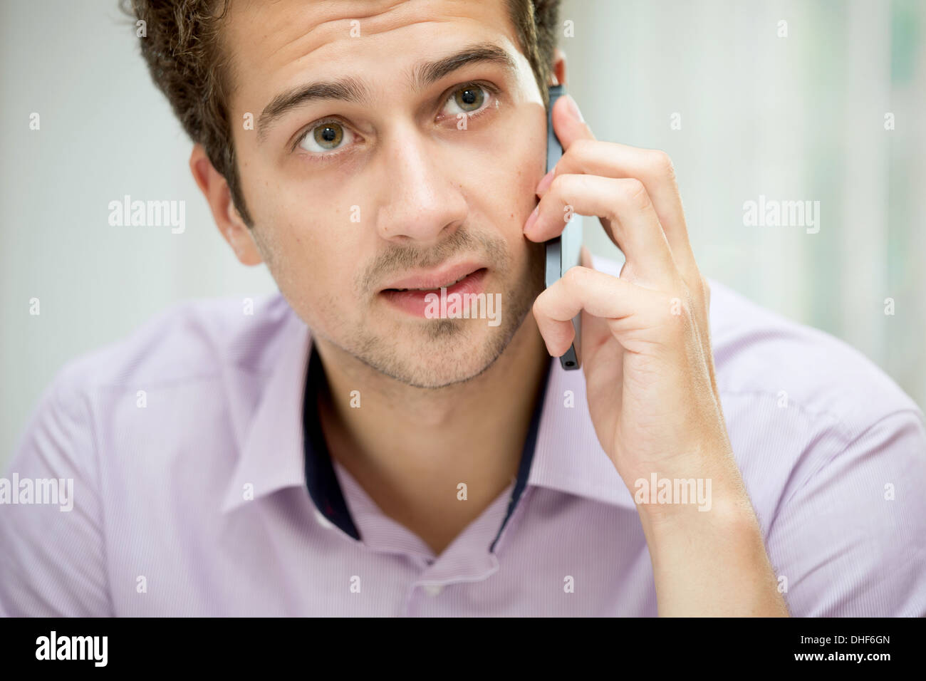 Office man on mobile phone hi-res stock photography and images - Alamy