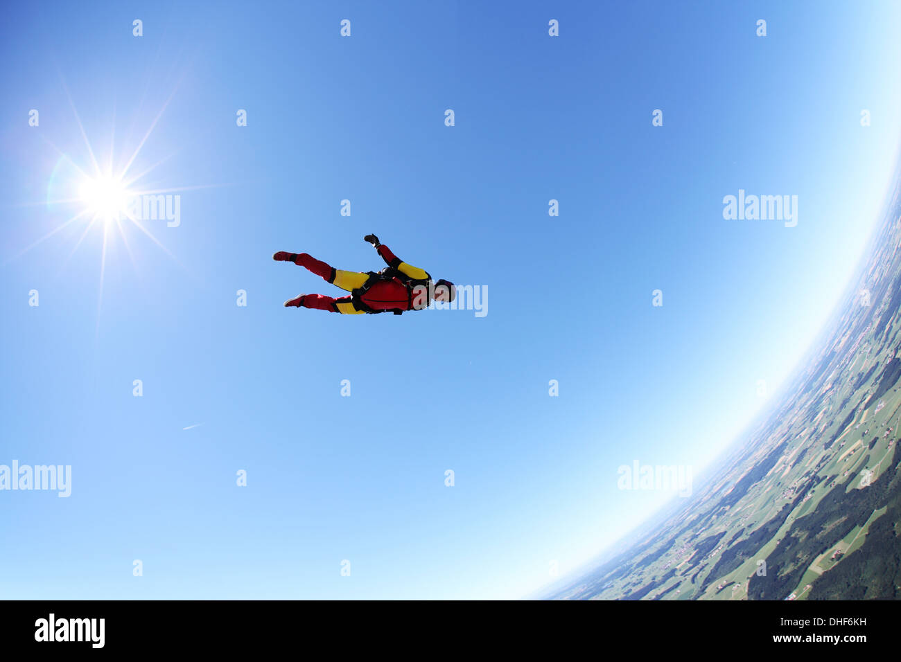 Skydiver free falling face down above Leutkirch, Bavaria, Germany Stock ...