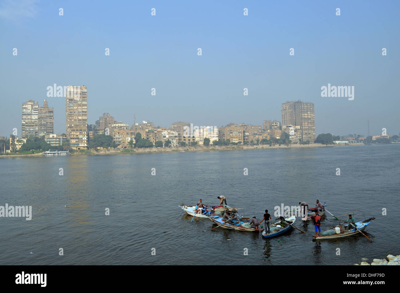 Local fishermen off Corniche El Nil on the right bank of the Nile River ...