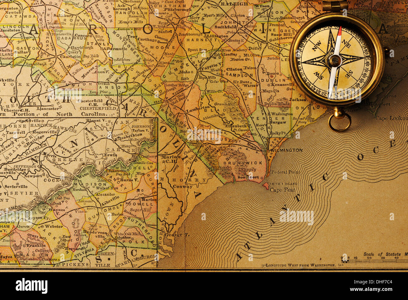 Antique compass over old XIX century map Stock Photo - Alamy