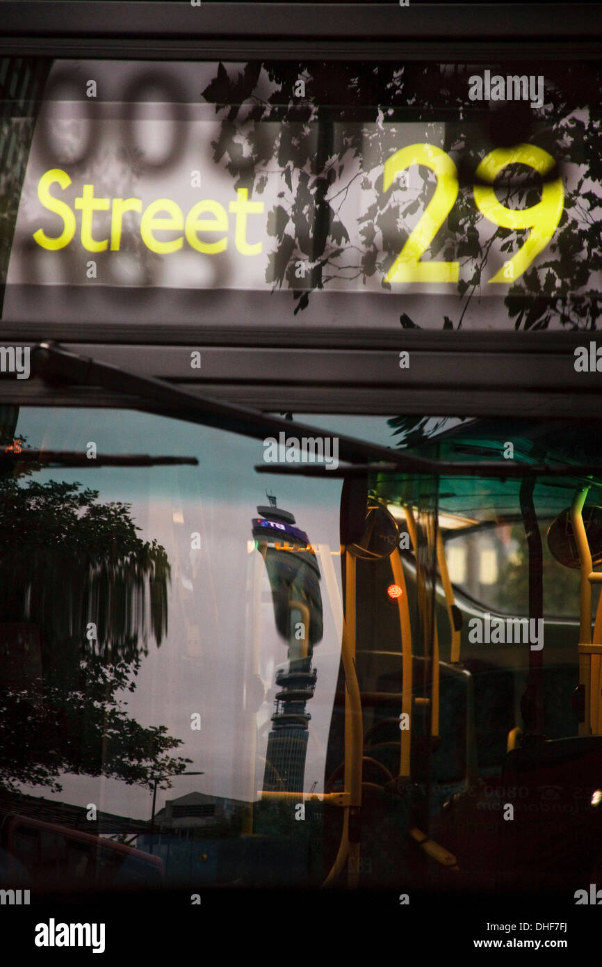 London bus window reflecting British Telecoms Tower central London ...