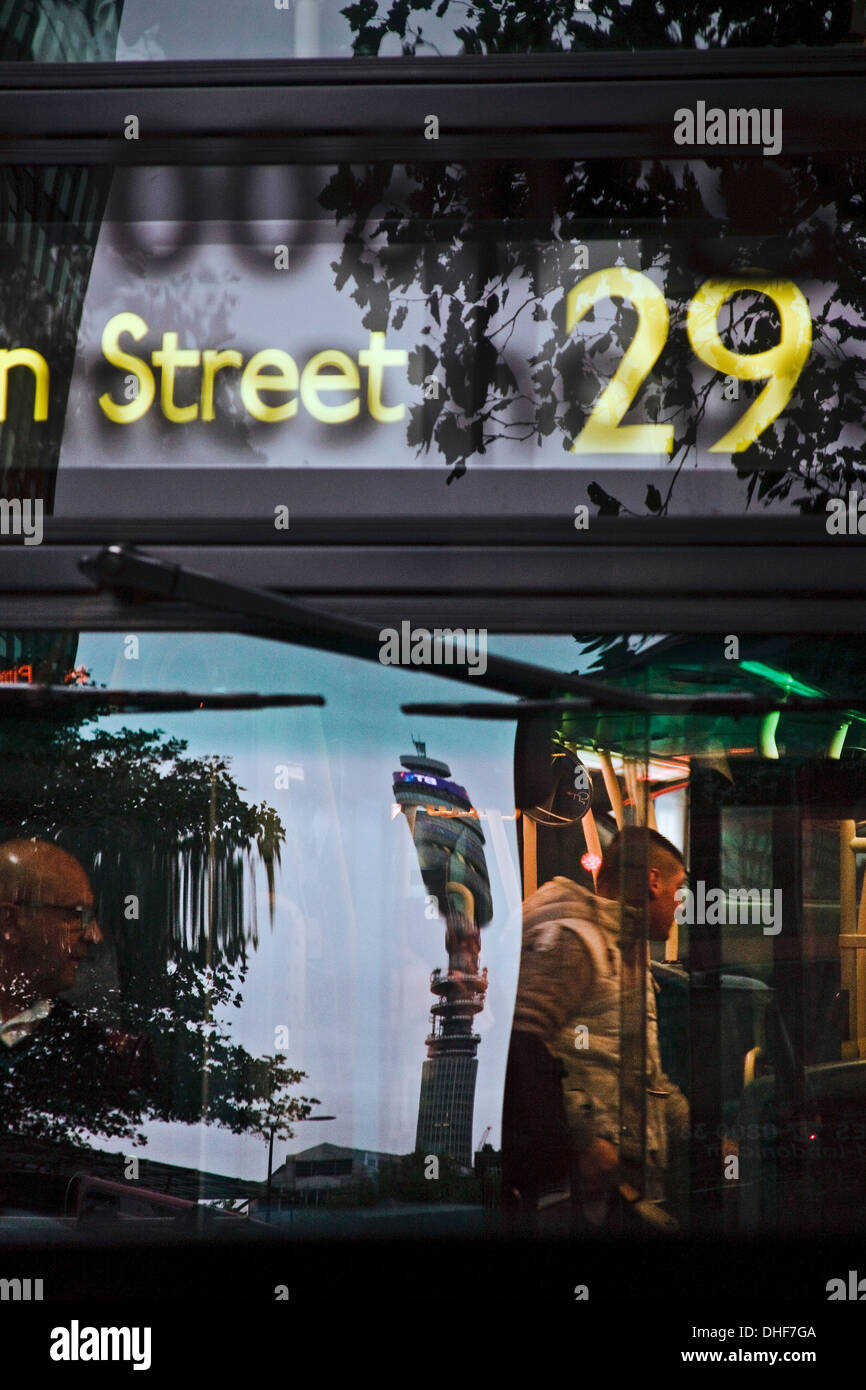 London bus window reflecting British Telecoms Tower central London ...