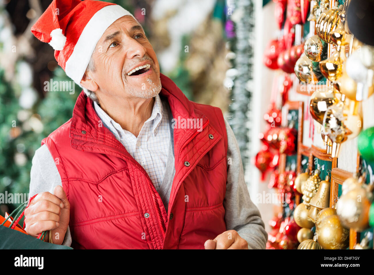 Man selecting christmas decorations hi-res stock photography and images ...