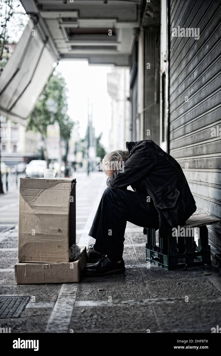 Beggar in the street Stock Photo - Alamy