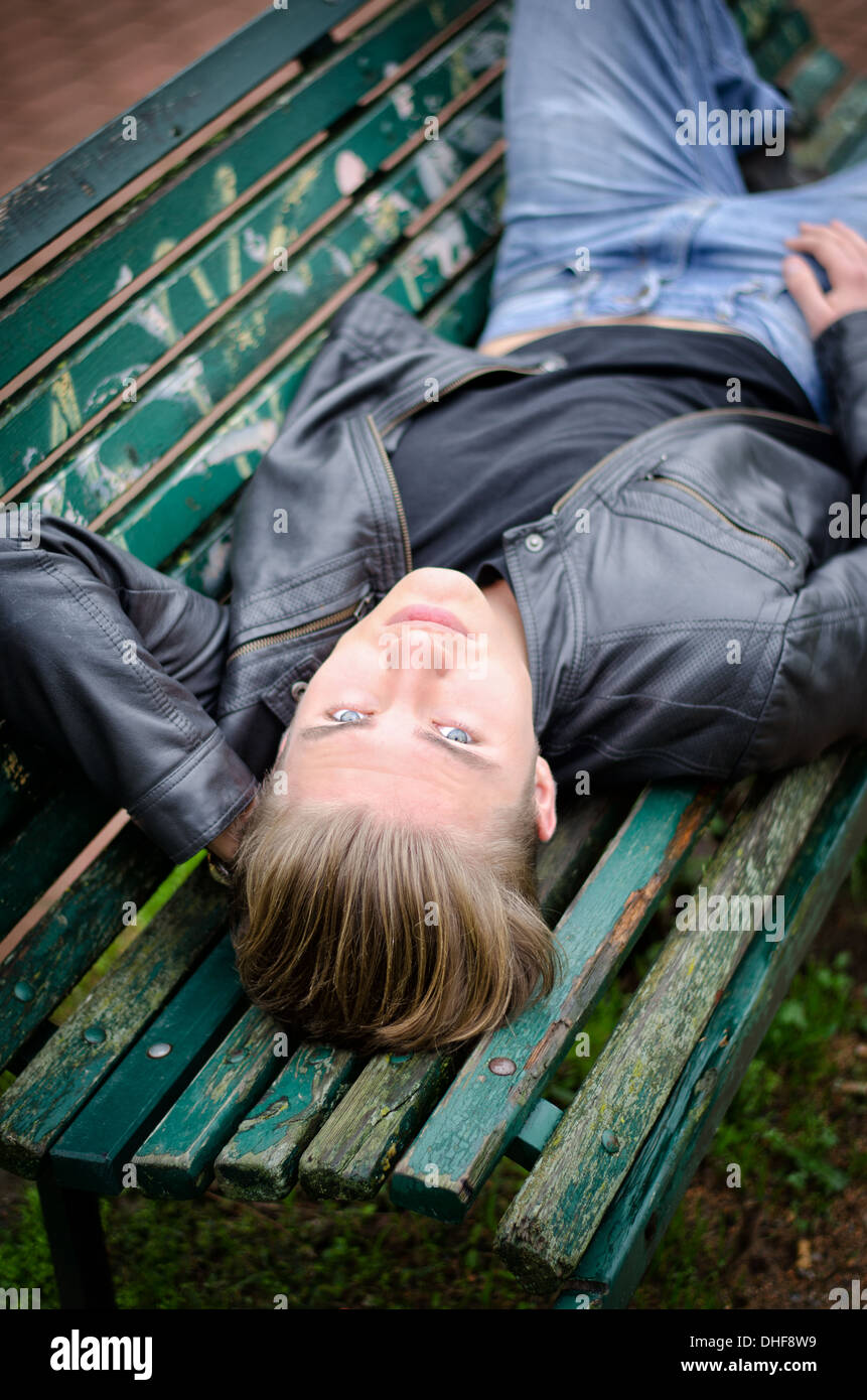 Man lying down on street hi-res stock photography and images - Alamy