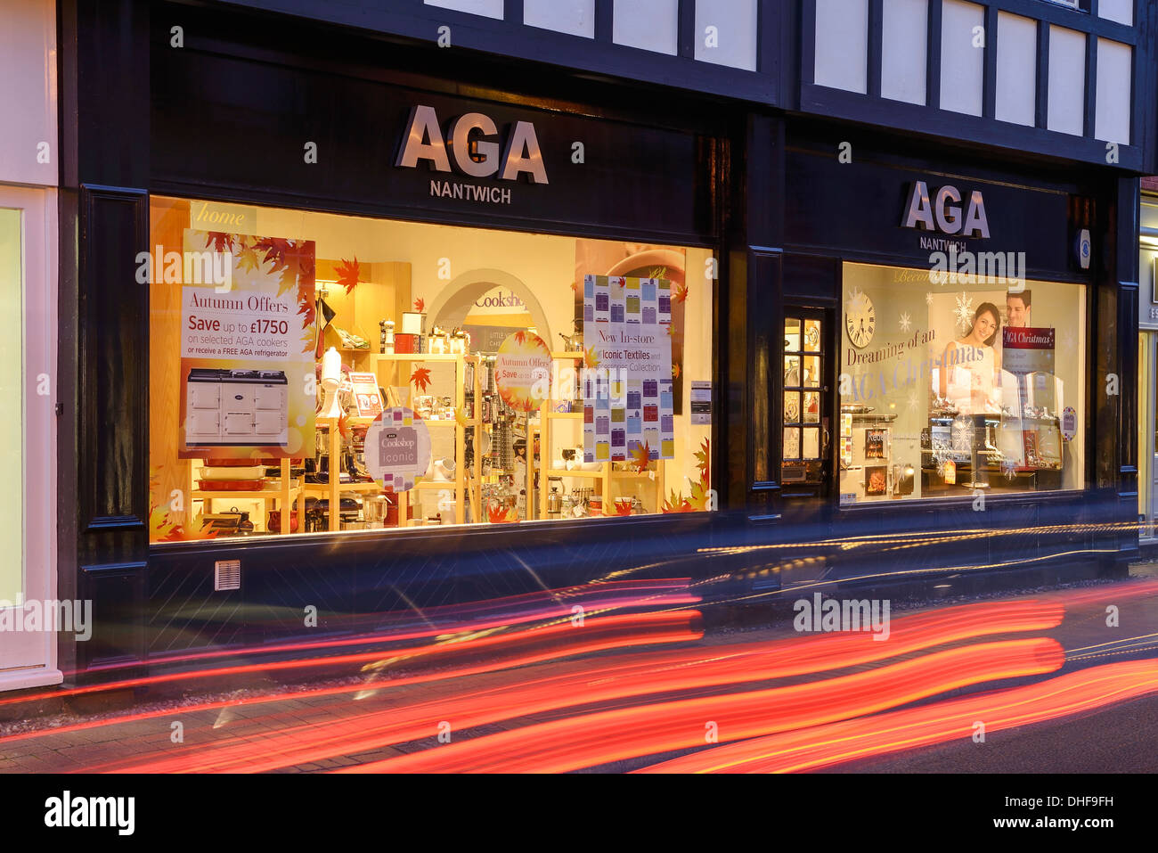 Cars driving past a branch of the Aga kitchen equipment shop Stock ...