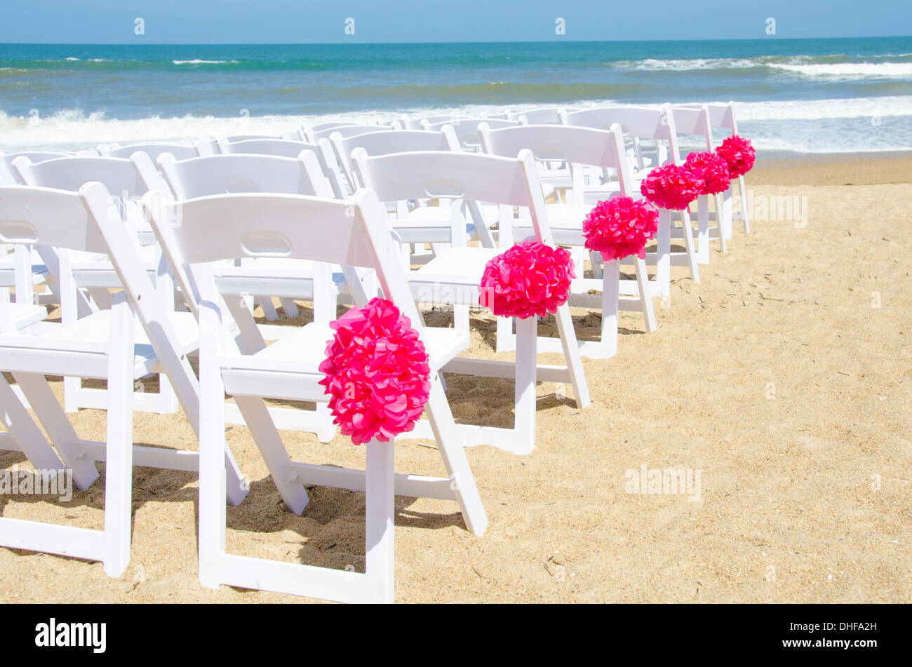 Wedding chairs set up for a ceremony at the seashore Stock Photo - Alamy