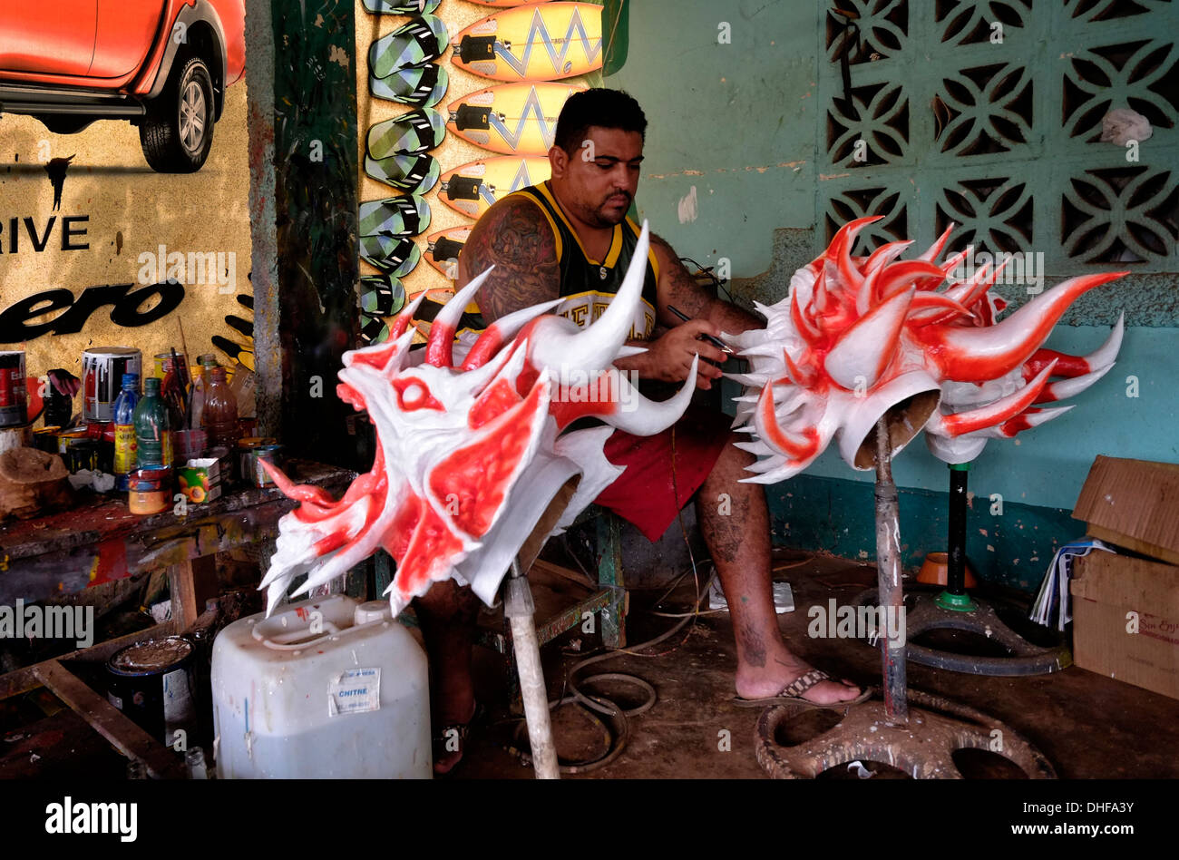 A traditional devil mask maker in his workshop in Villa de los Santos ...