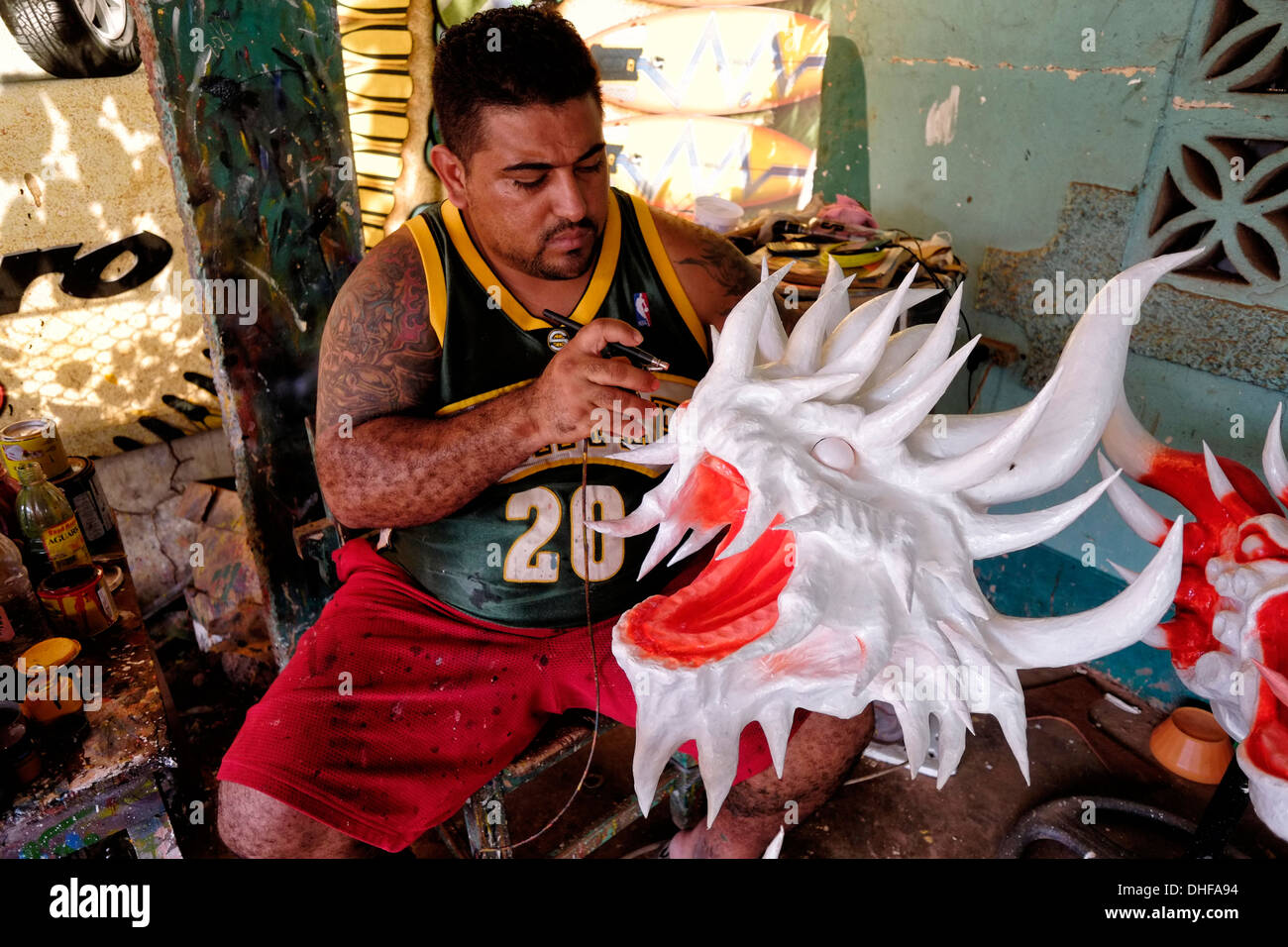A traditional devil mask maker in his workshop in Villa de los Santos ...