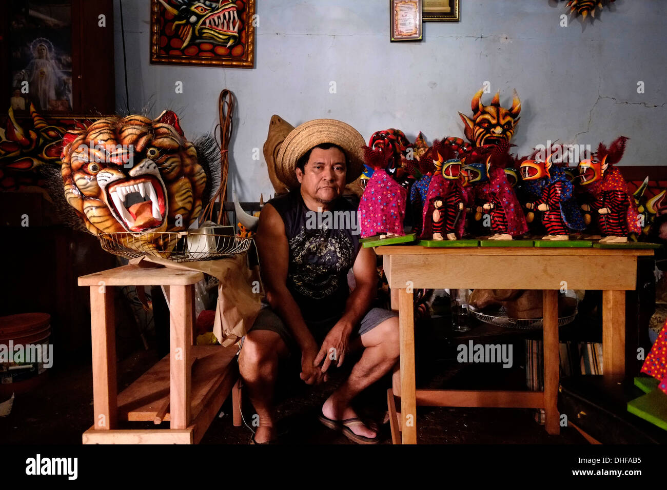 A traditional devil mask maker in his workshop in Villa de los Santos ...