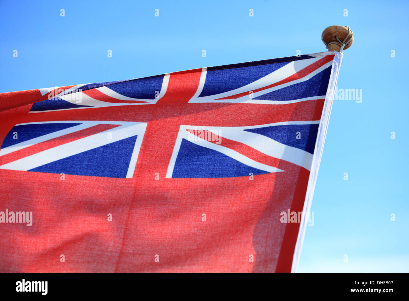 The UK red ensign the british maritime flag flown from a yacht sail ...