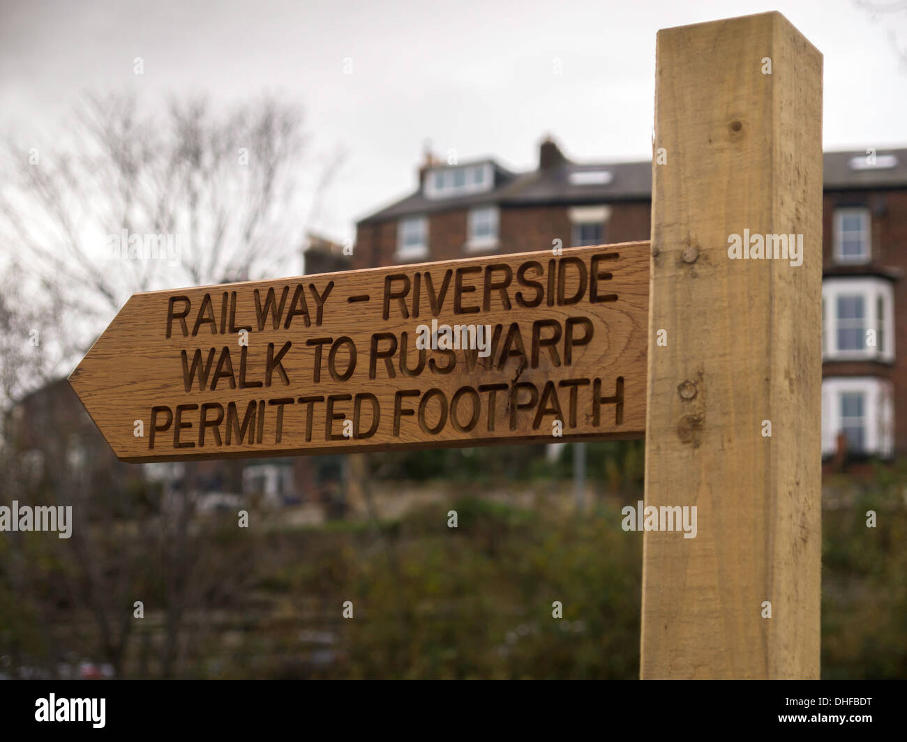 Sign post for the permitted footpath along the river Esk and railway ...