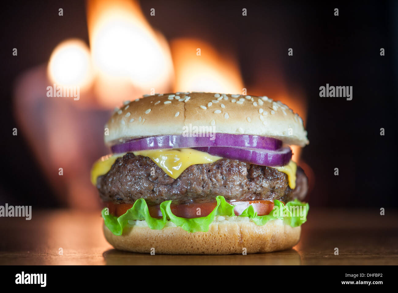 Hamburger fire flame cheeseburger hi-res stock photography and images ...