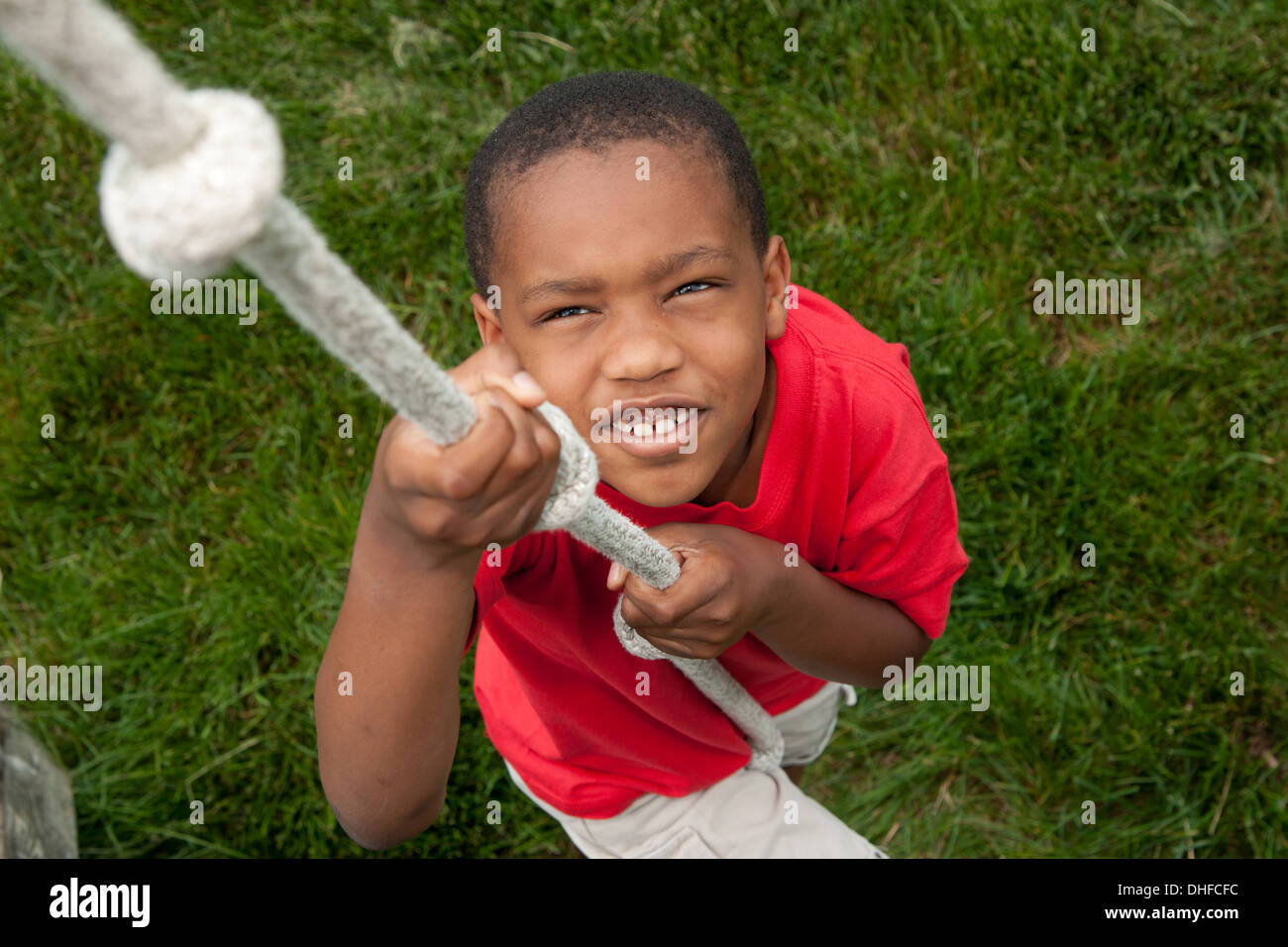 Child rope climbing african american hi-res stock photography and ...