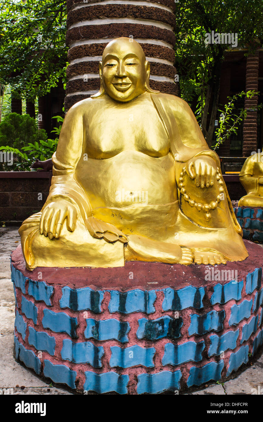 Fat gold buddha statue hi-res stock photography and images - Alamy