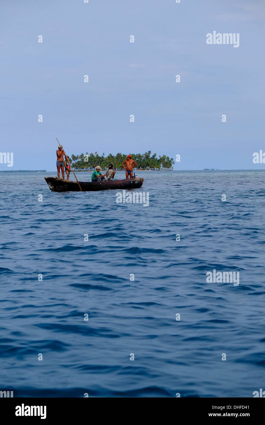 Men from the Guna people boating in a Cayuko hand-built dugout canoe in ...