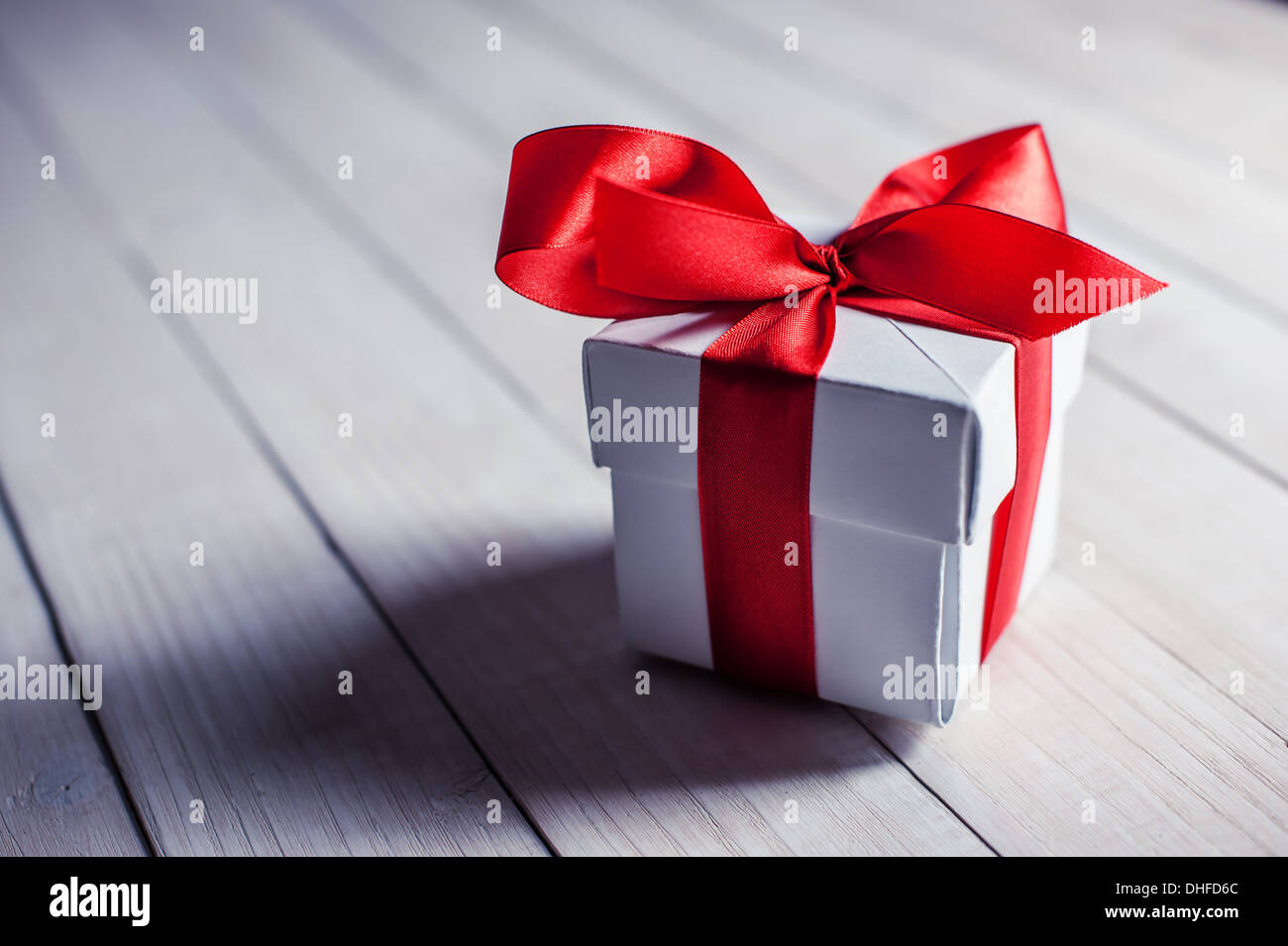 single gift box on wood table Stock Photo - Alamy