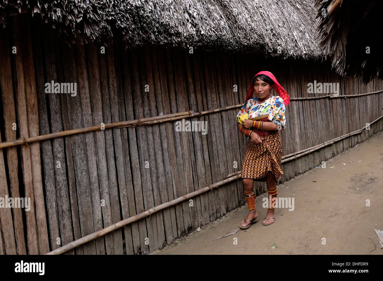 A woman from the Guna people walking in Carti Sugtupu island village ...