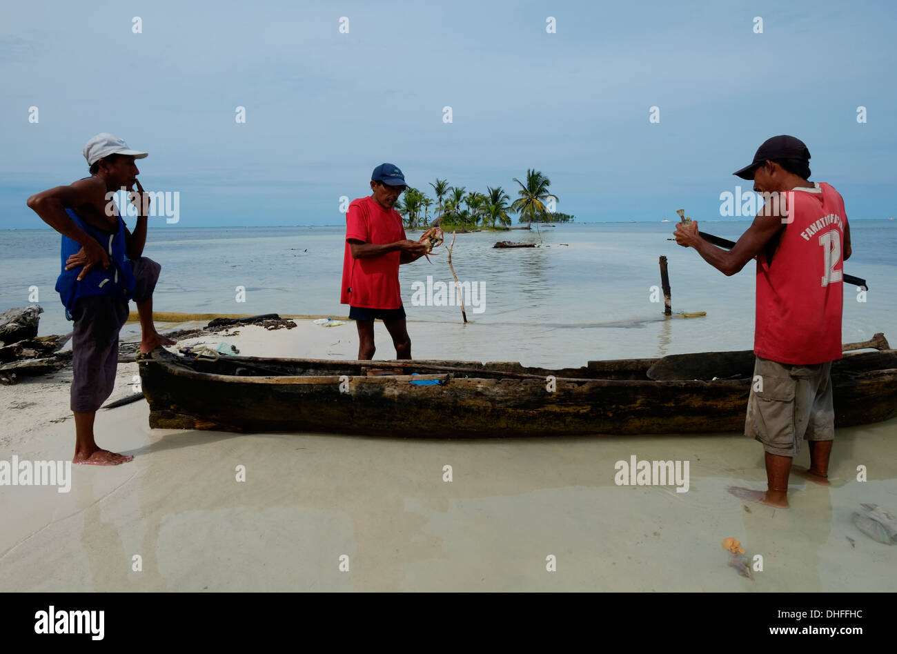 Men from the Guna people with a Cayuko hand-built dugout canoe in the ...