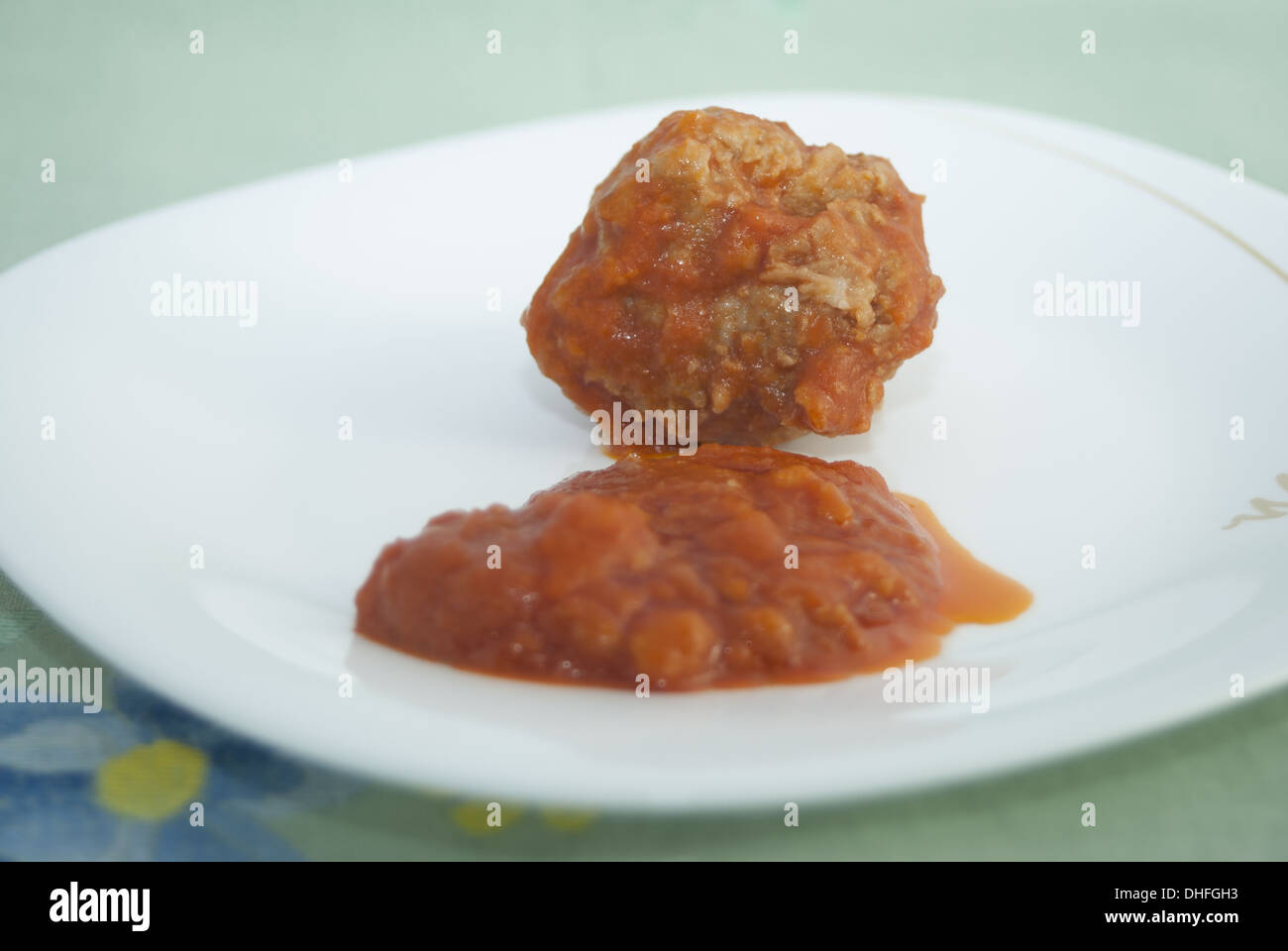 a typical Italian recipe: rissole of mincemeat with tomato sauce Stock ...