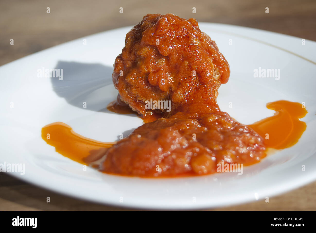 a typical Italian recipe: rissole of mincemeat with tomato sauce Stock ...