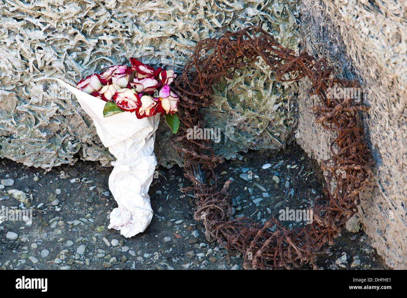 A wreath of flowers at the execution wall in Auschwitz concentration ...