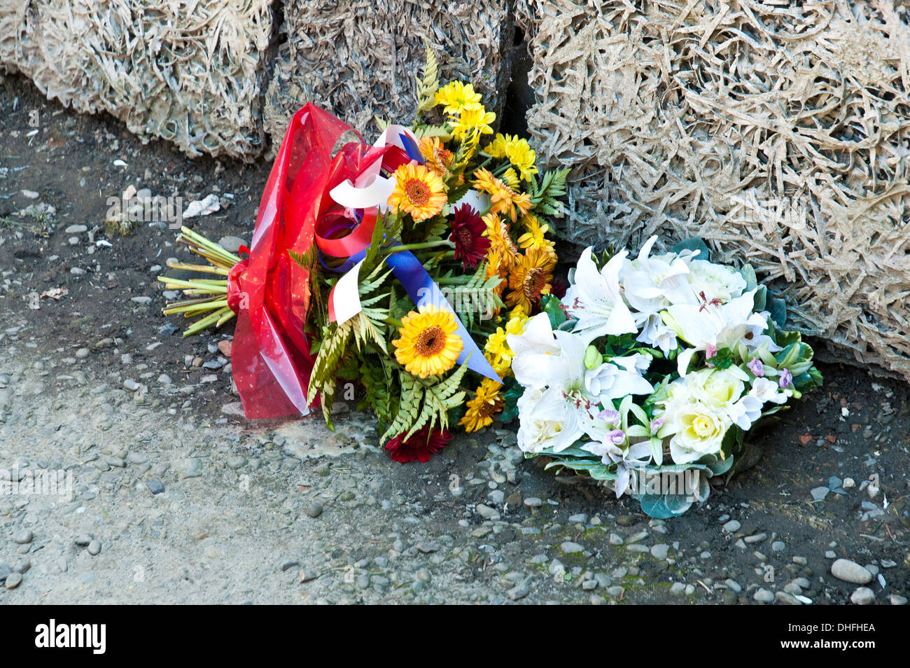A wreath of flowers at the execution wall in Auschwitz concentration ...