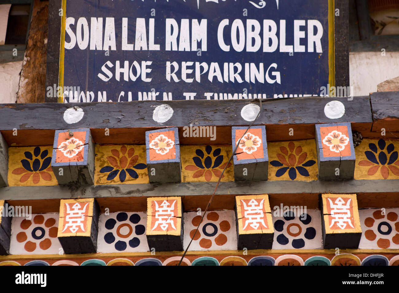 Bhutan, Thimpu, Norzim Lam, cobbler’s sign on traditional building ...