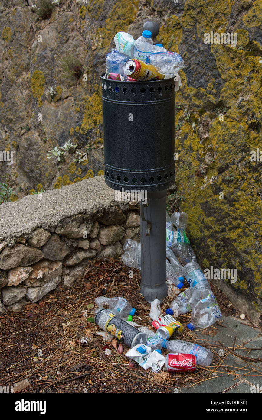 Over flowing waste bin Stock Photo - Alamy