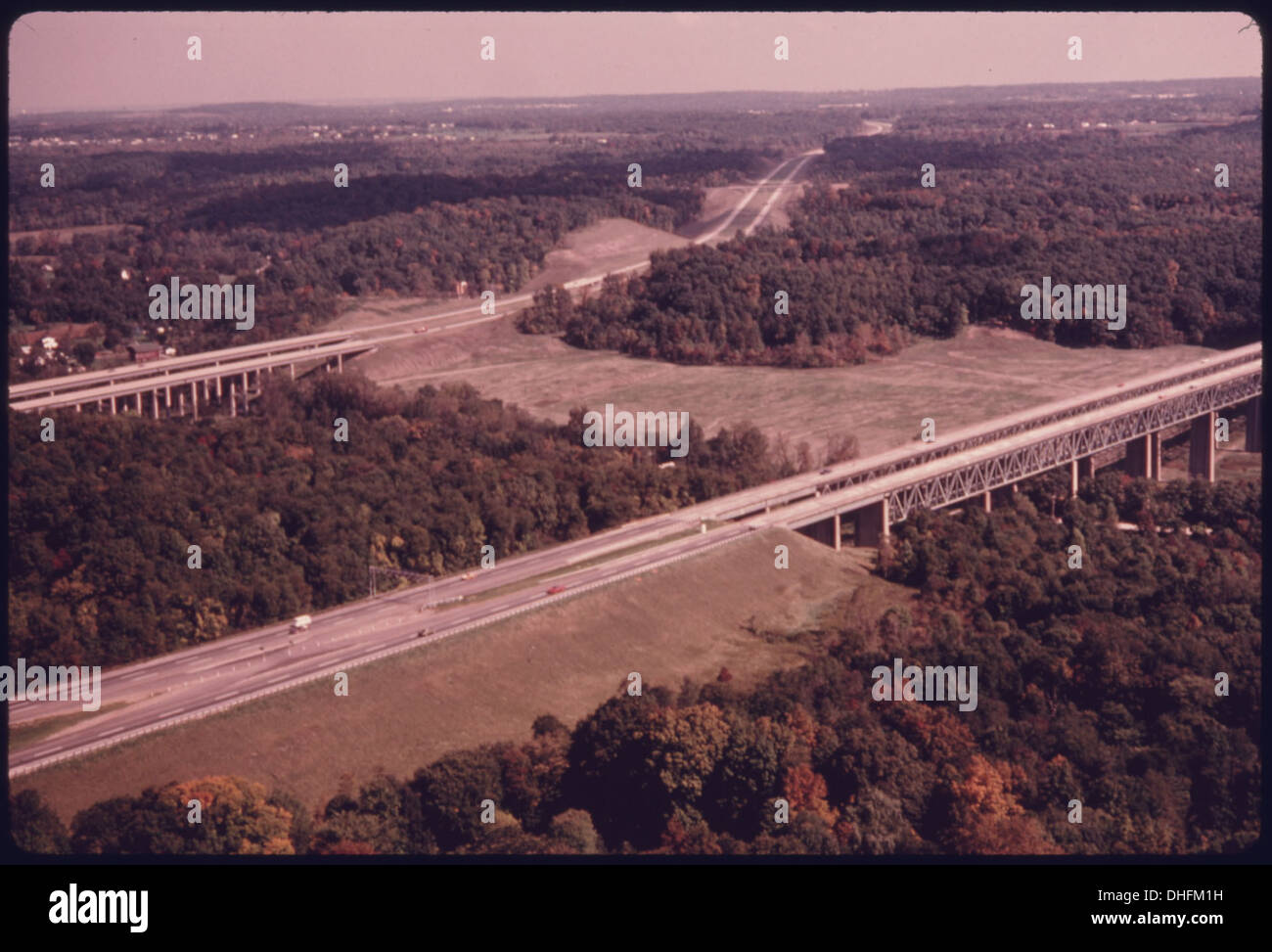 This aerial photograph shows the Ohio Turnpike in the 1950s, with its ...