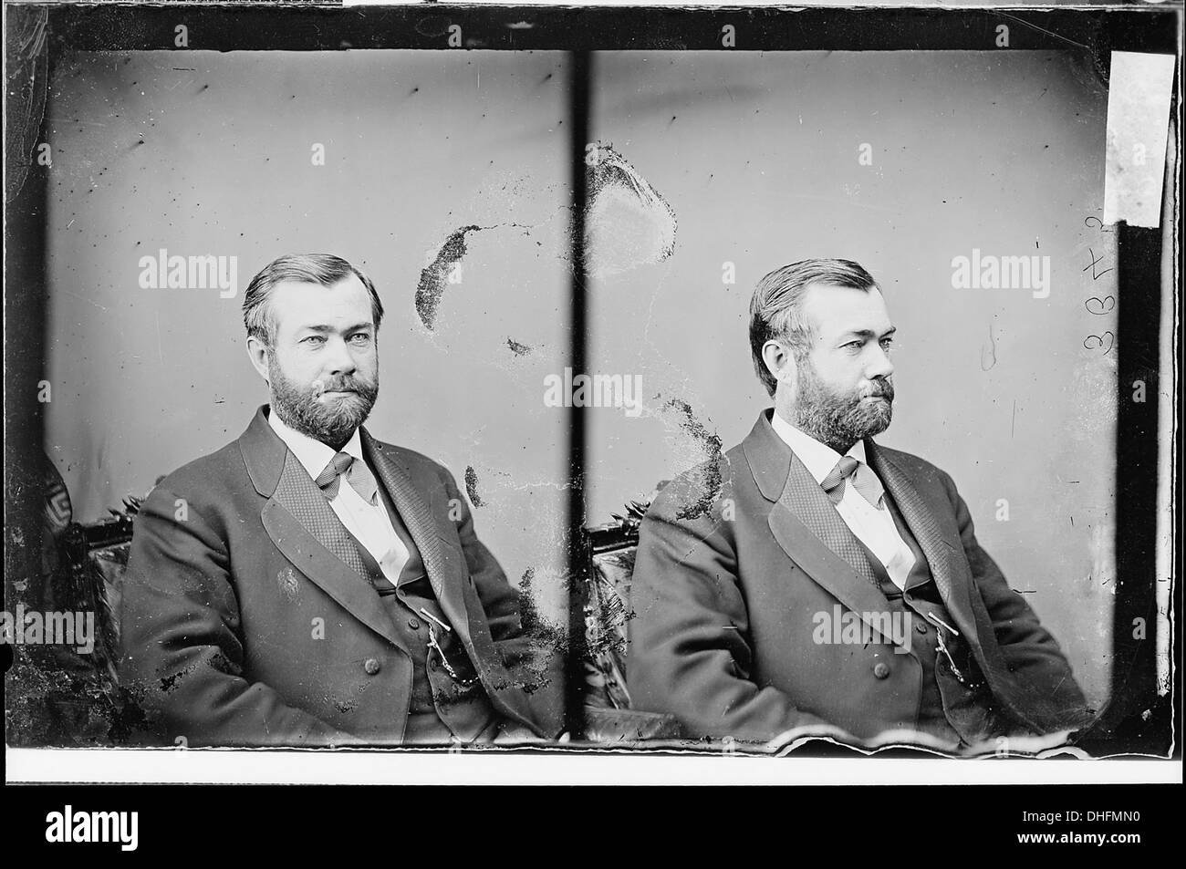 This photograph captures a gentleman in a formal setting, showcasing ...