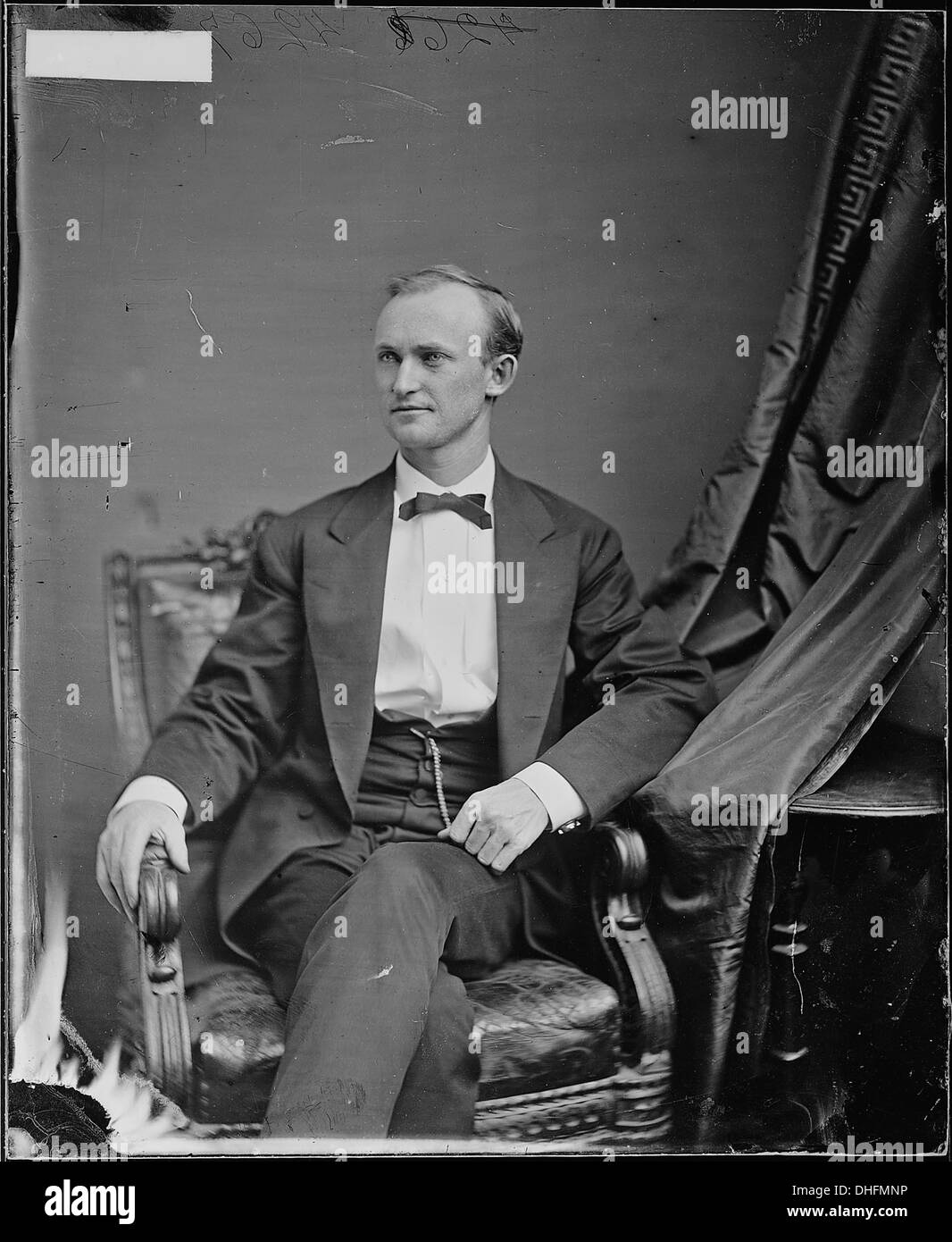 A formal portrait of a gentleman, representing traditional attire and ...