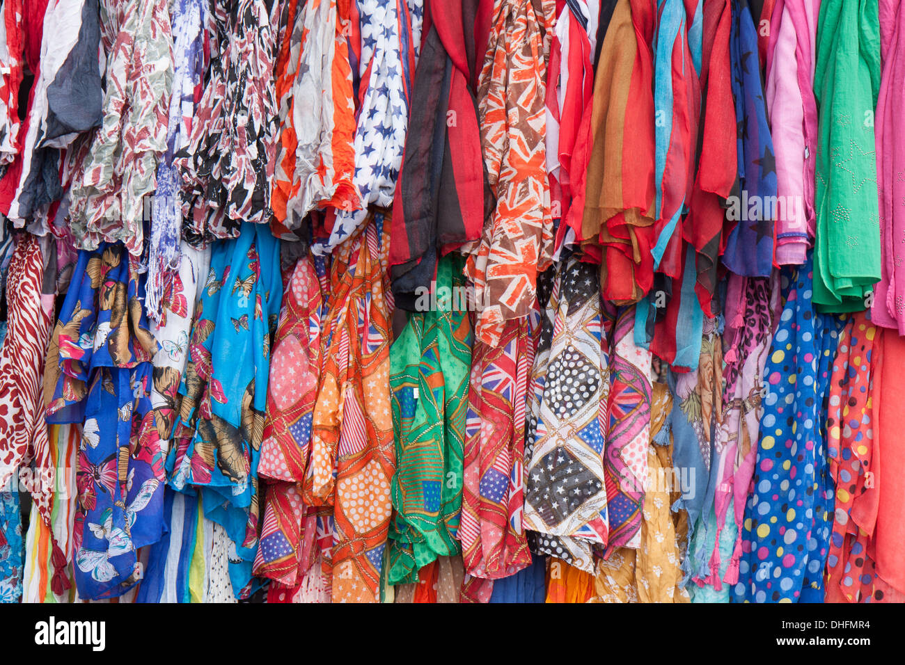 Colorful clothes for sale at a market Stock Photo - Alamy
