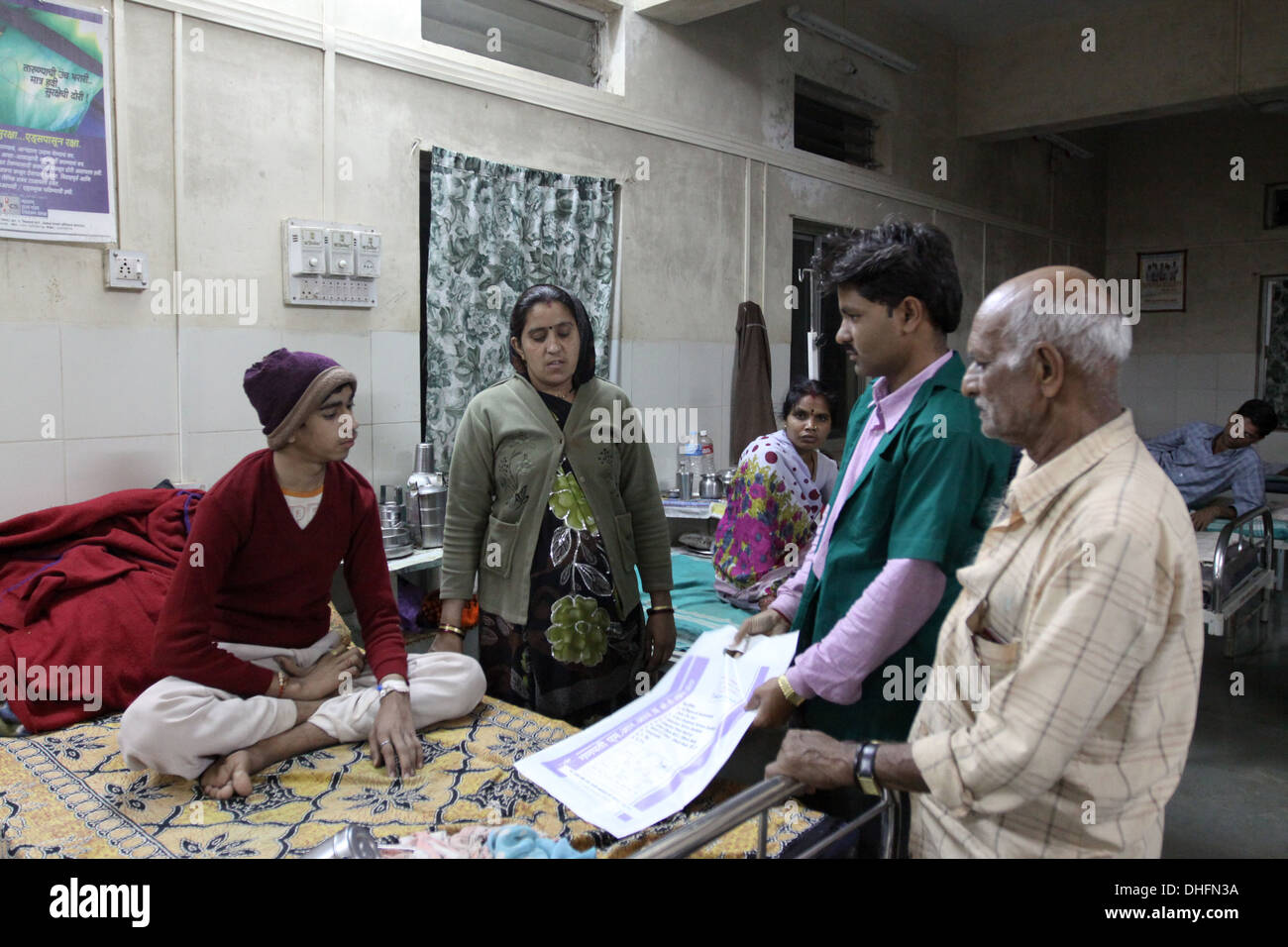 Doctors and patients at a public health care centre in rural India ...