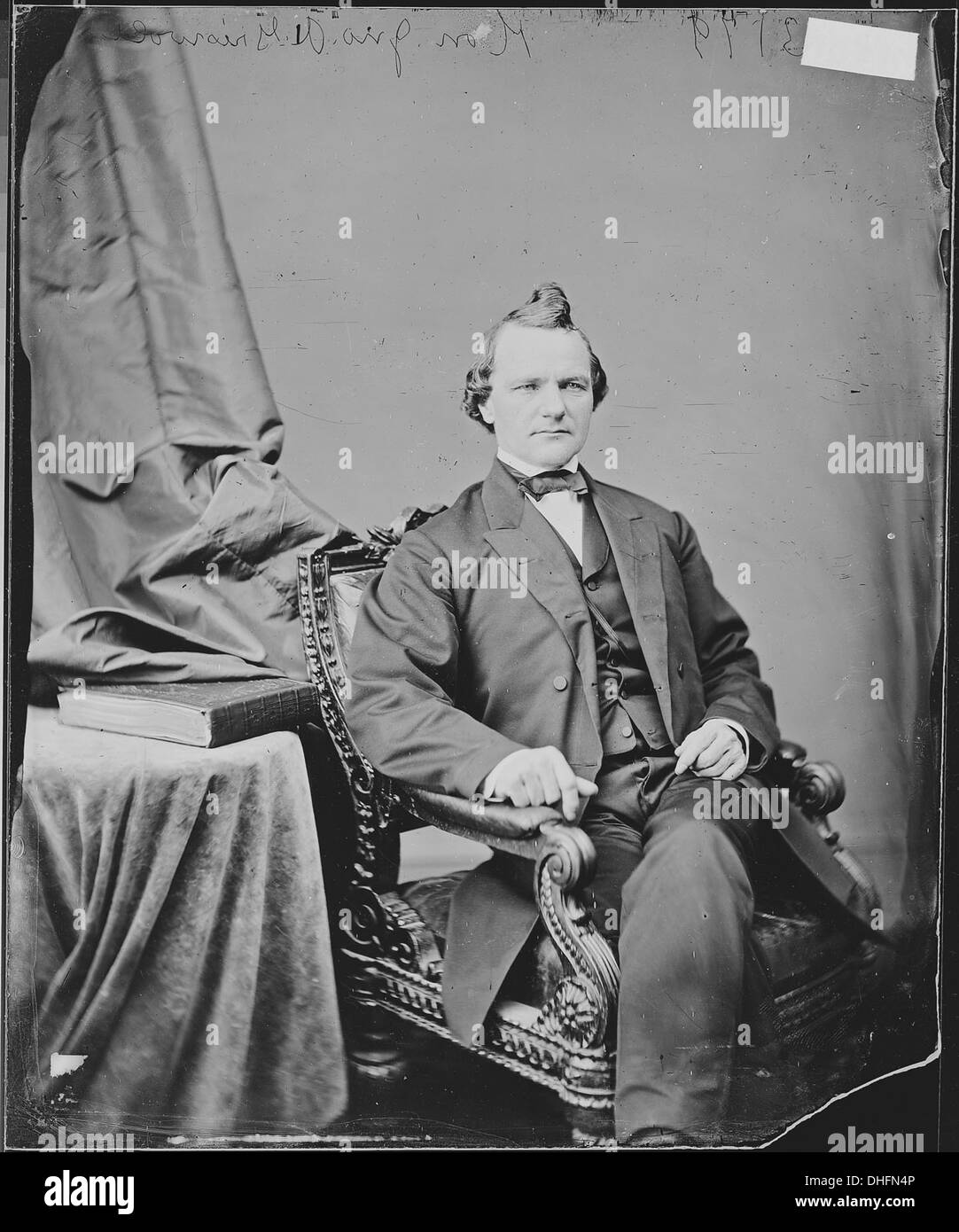 This is a formal portrait of a gentleman, showcasing his attire and ...