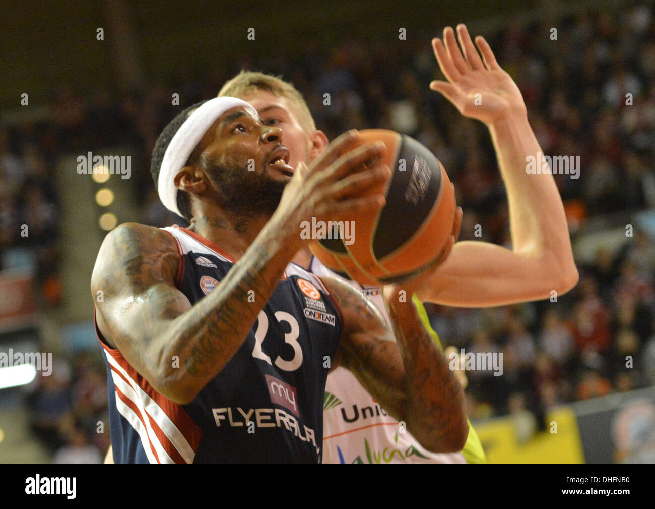 Munich, Germany. 08th Nov, 2013. Munich's Malcolm Delaney (L) and ...