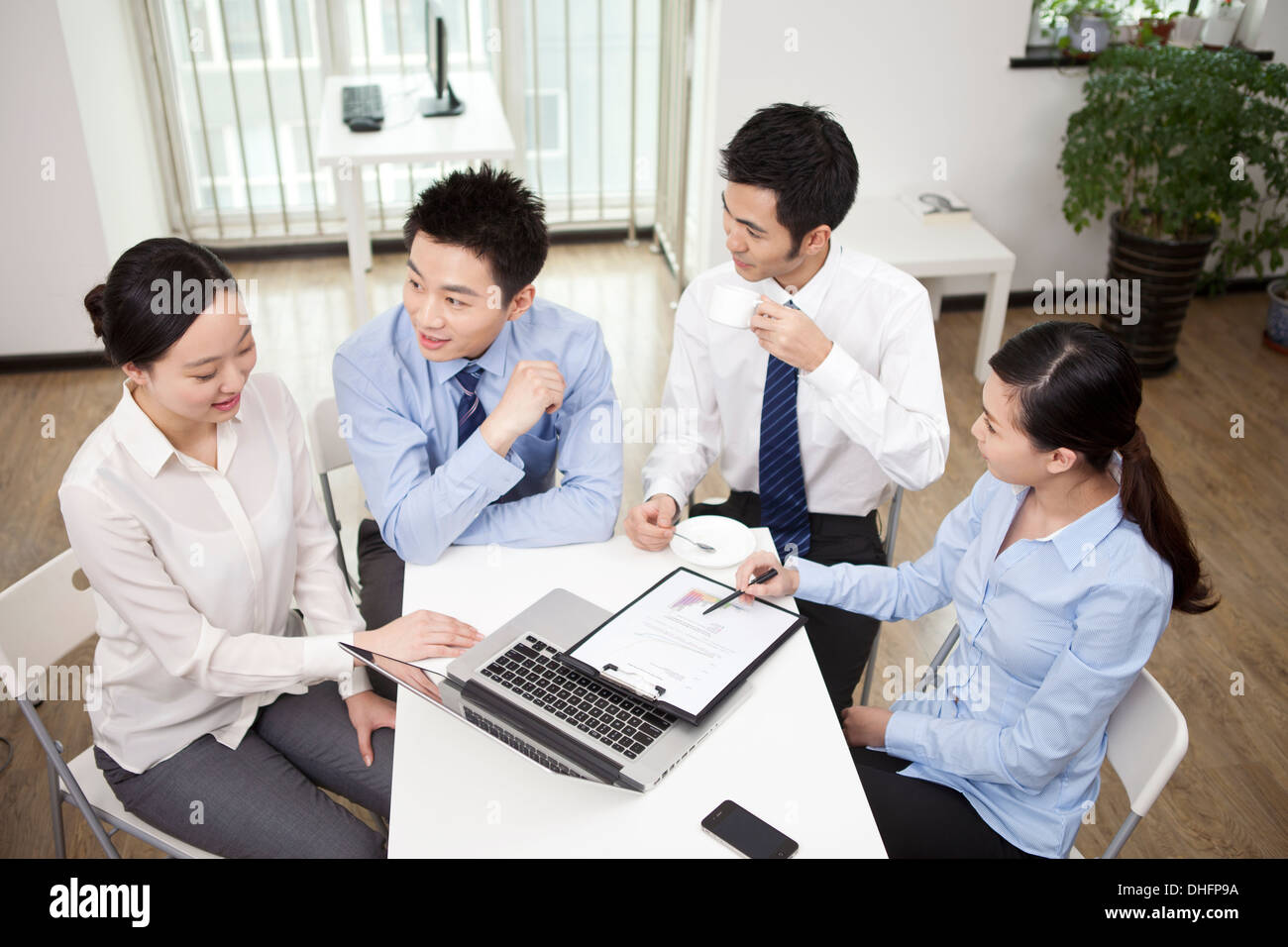 Standing smiling pointing looking away authority hi-res stock ...