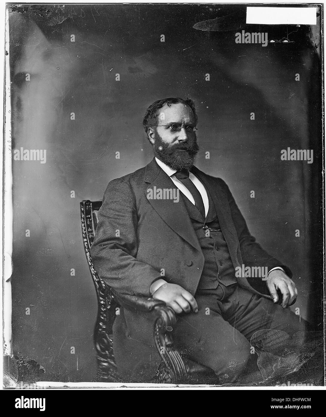 A photograph of a gentleman dressed in formal attire, representing a ...