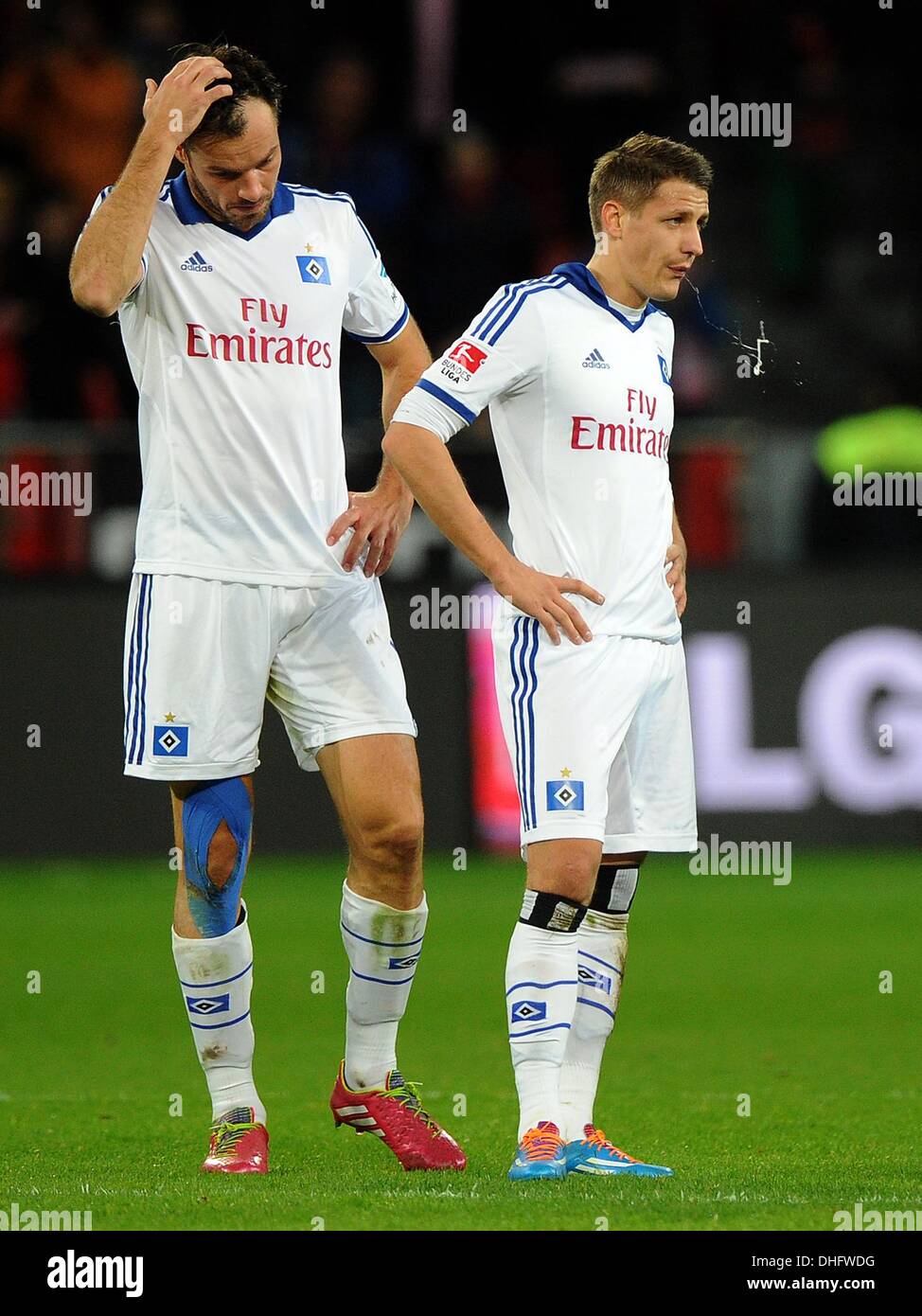 Leverkusen, Germany. 09th Nov, 2013. Hamburg's Heiko Westermann (L) and ...