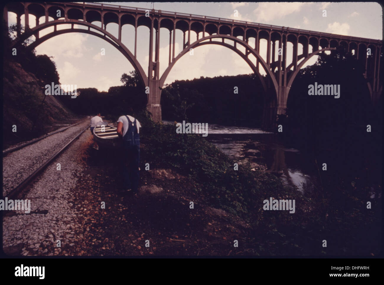 Canoeists prepare to launch their boat at the base of the Ohio Highway ...