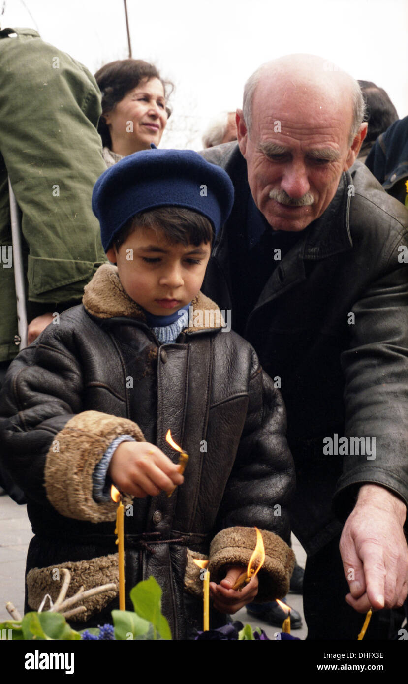 Child lighting candles in front of Parliament in Tbilisi, Georgia on ...