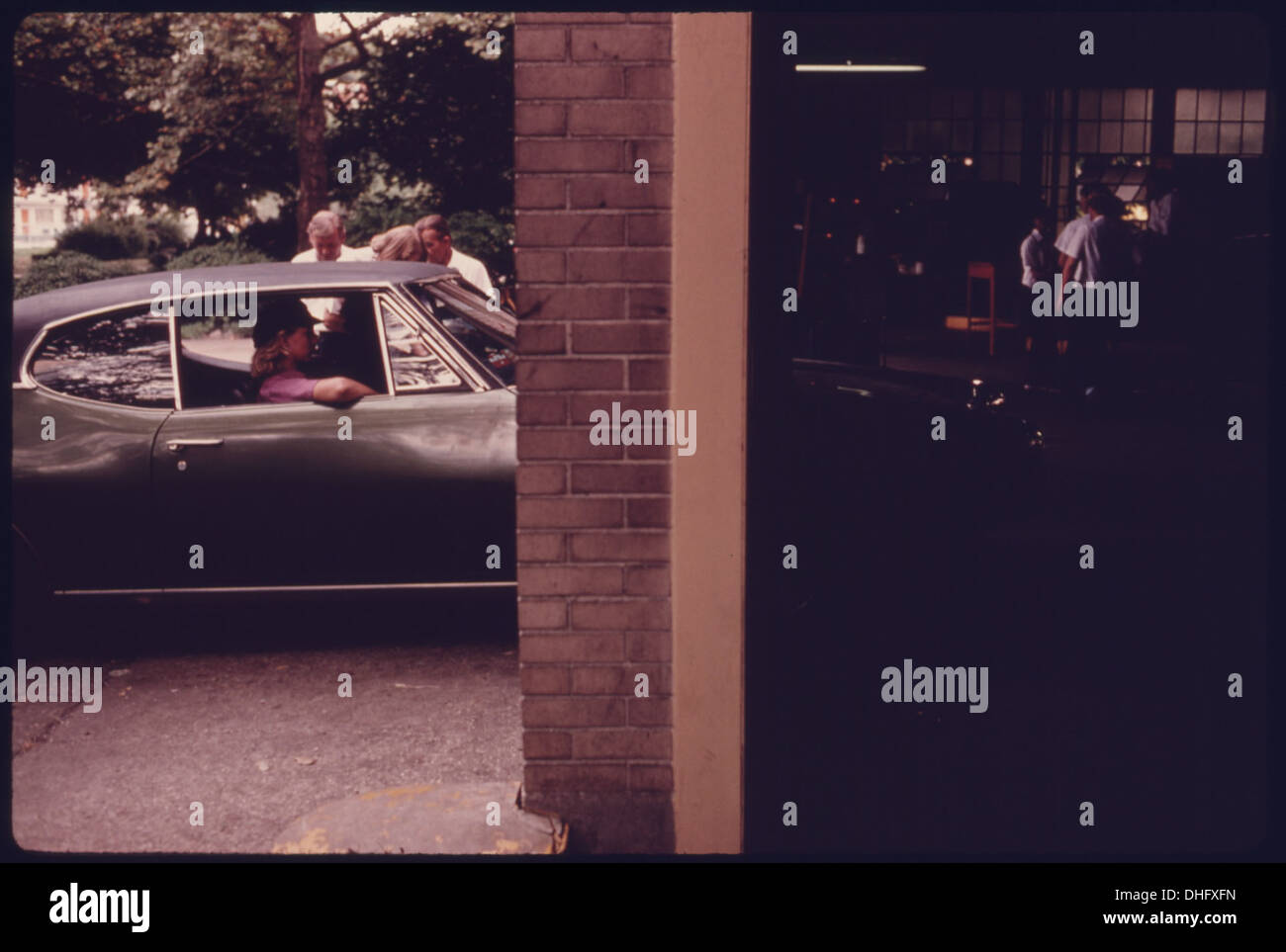 CAR ENTERING A SAFETY INSPECTION BUILDING IN AN EASILY ACCESSIBLE ...