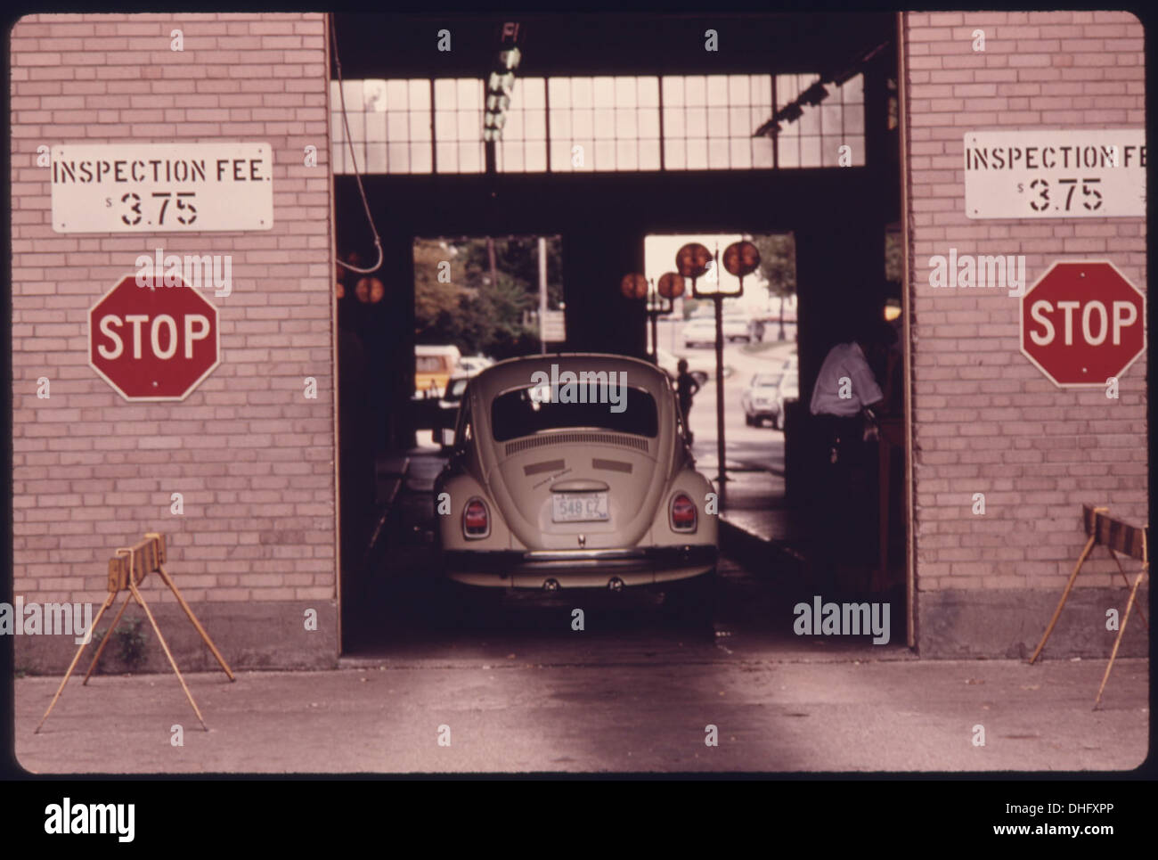 A car has entered the safety lane at an auto emission inspection ...