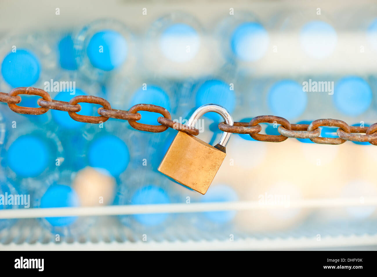 padlock and chain on the refrigerator with water Stock Photo - Alamy
