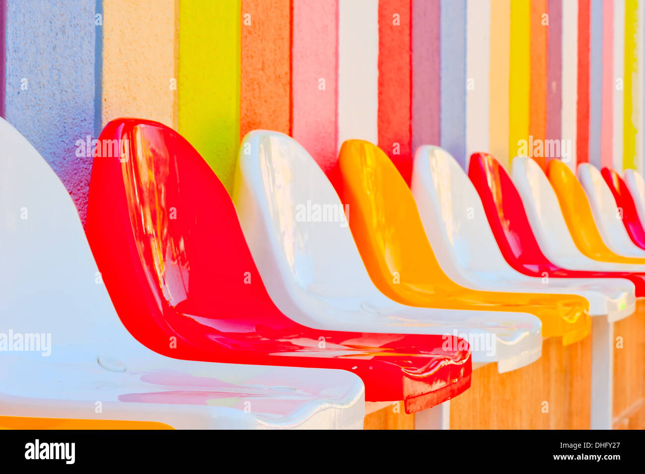 bright colored seats in the kids' club Stock Photo - Alamy
