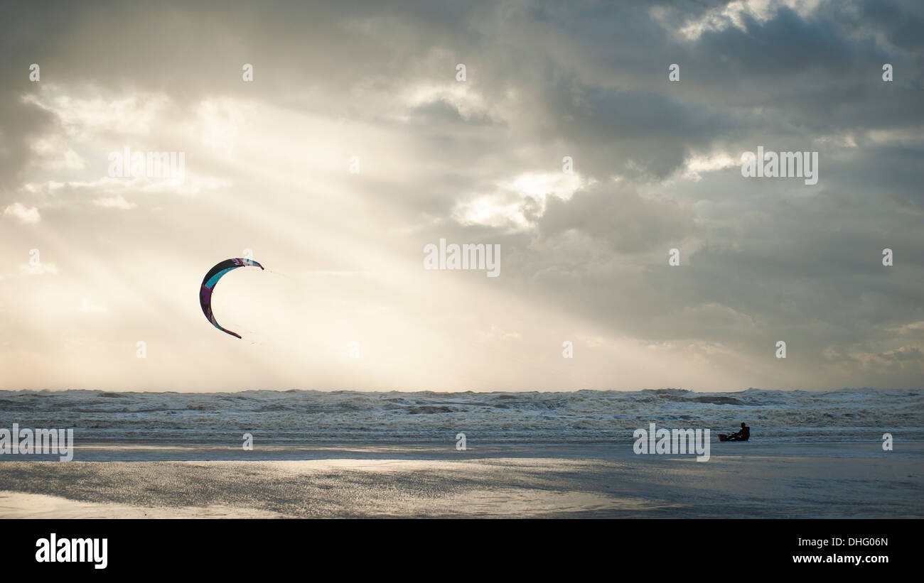 Kite surfer flying through the air Stock Photo - Alamy