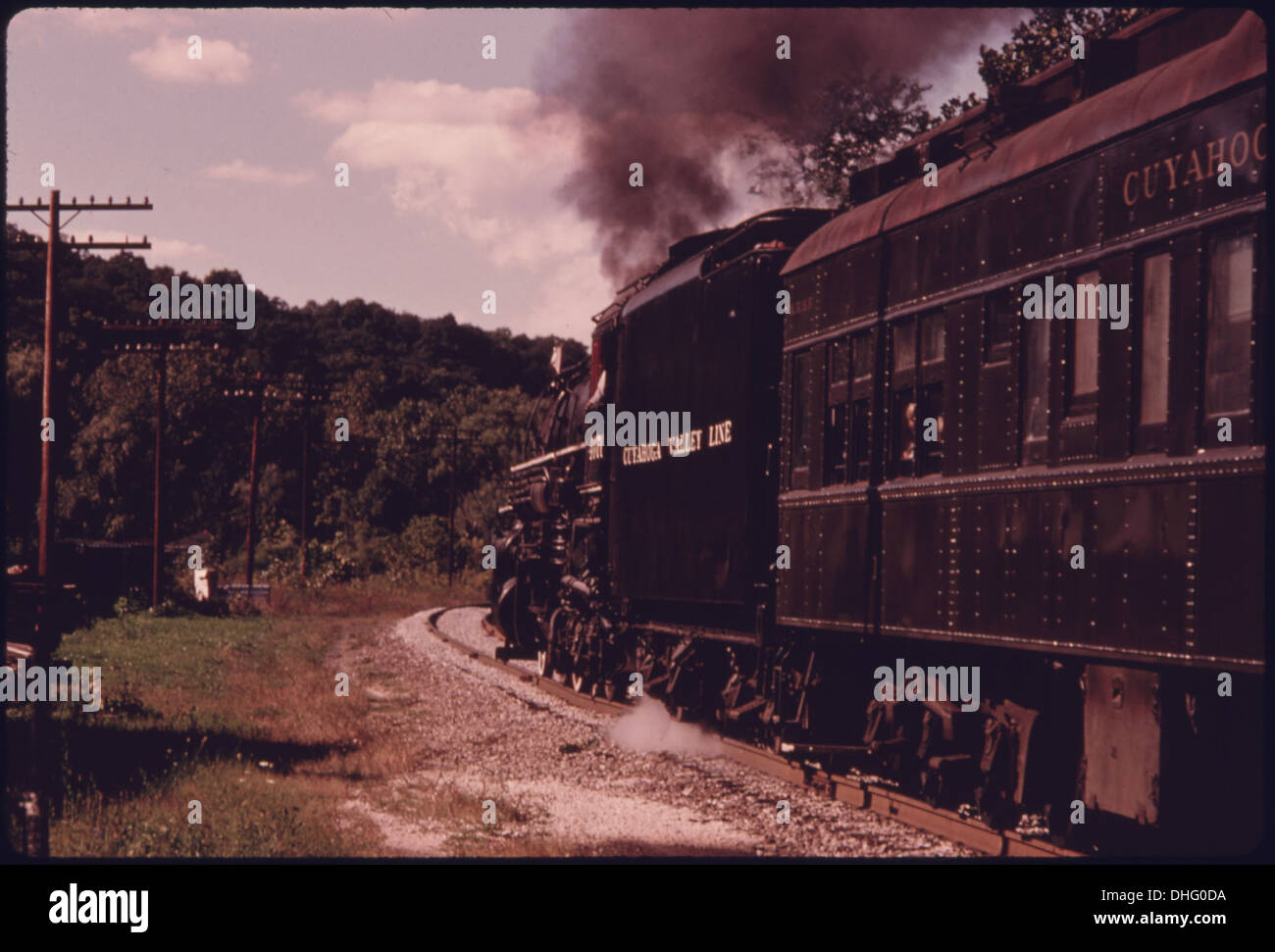 A steam-powered excursion train from the Cuyahoga Valley Line passing ...